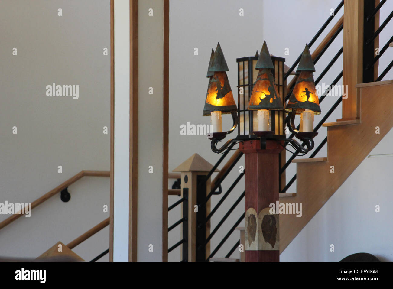 Old faithful snow lodge indoor light fixture hi-res stock photography ...