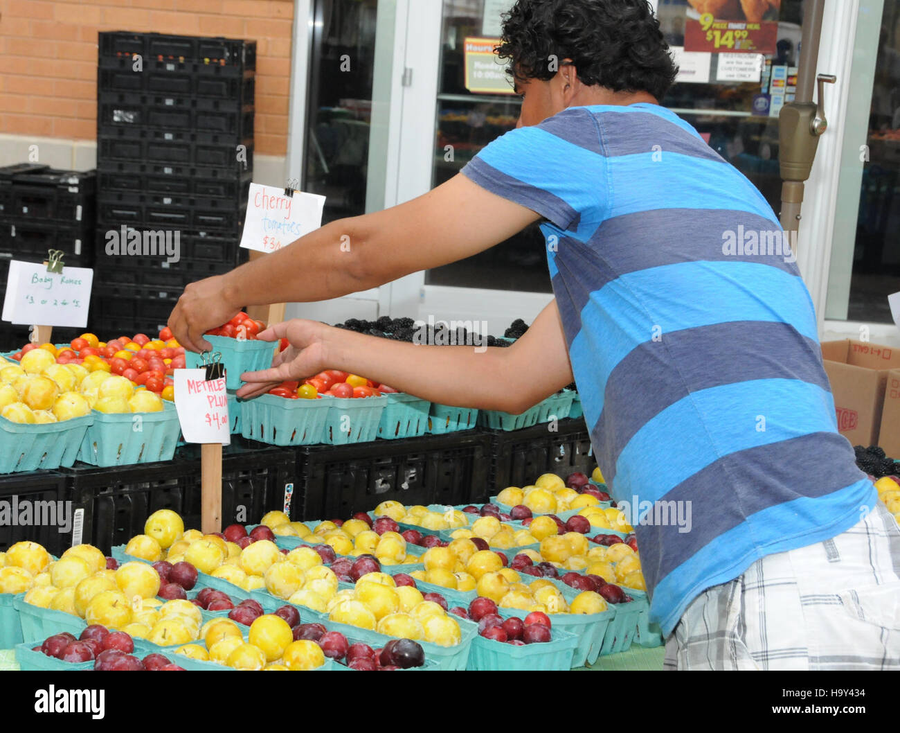 This image shows the setup of a produce stand, part of the USDA’s ...