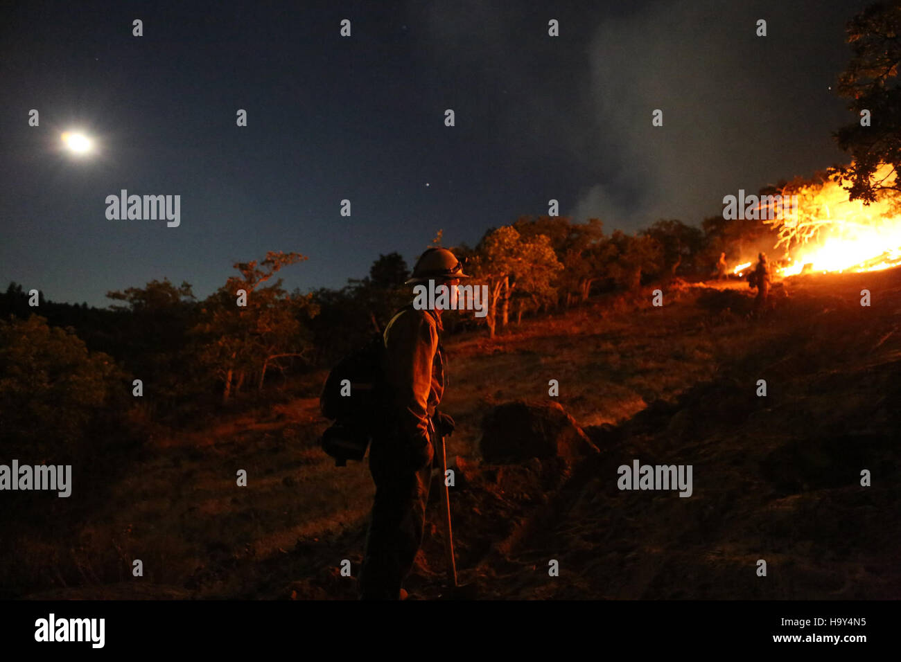 This image depicts the Government Flats Complex Fire, a wildfire that ...