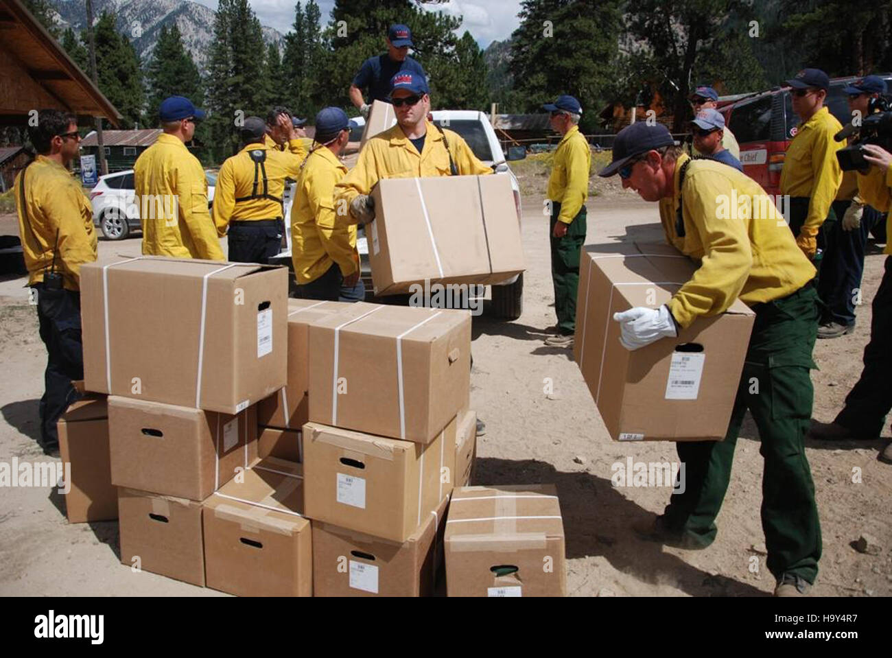 This image documents the Little Queens Fire, a forest fire event in a U ...