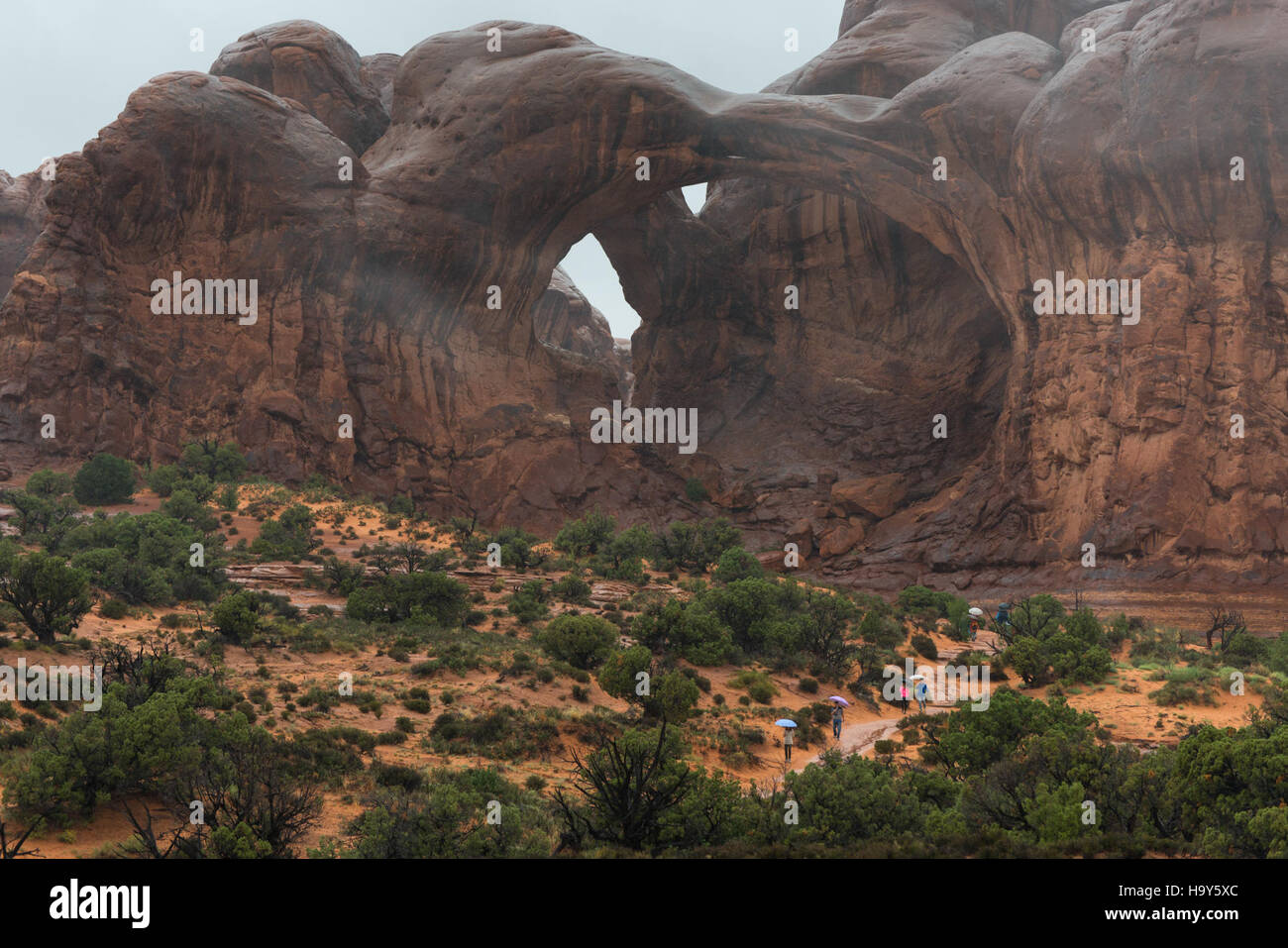 The Parade of Parasols event at Double Arch in Arches National Park ...