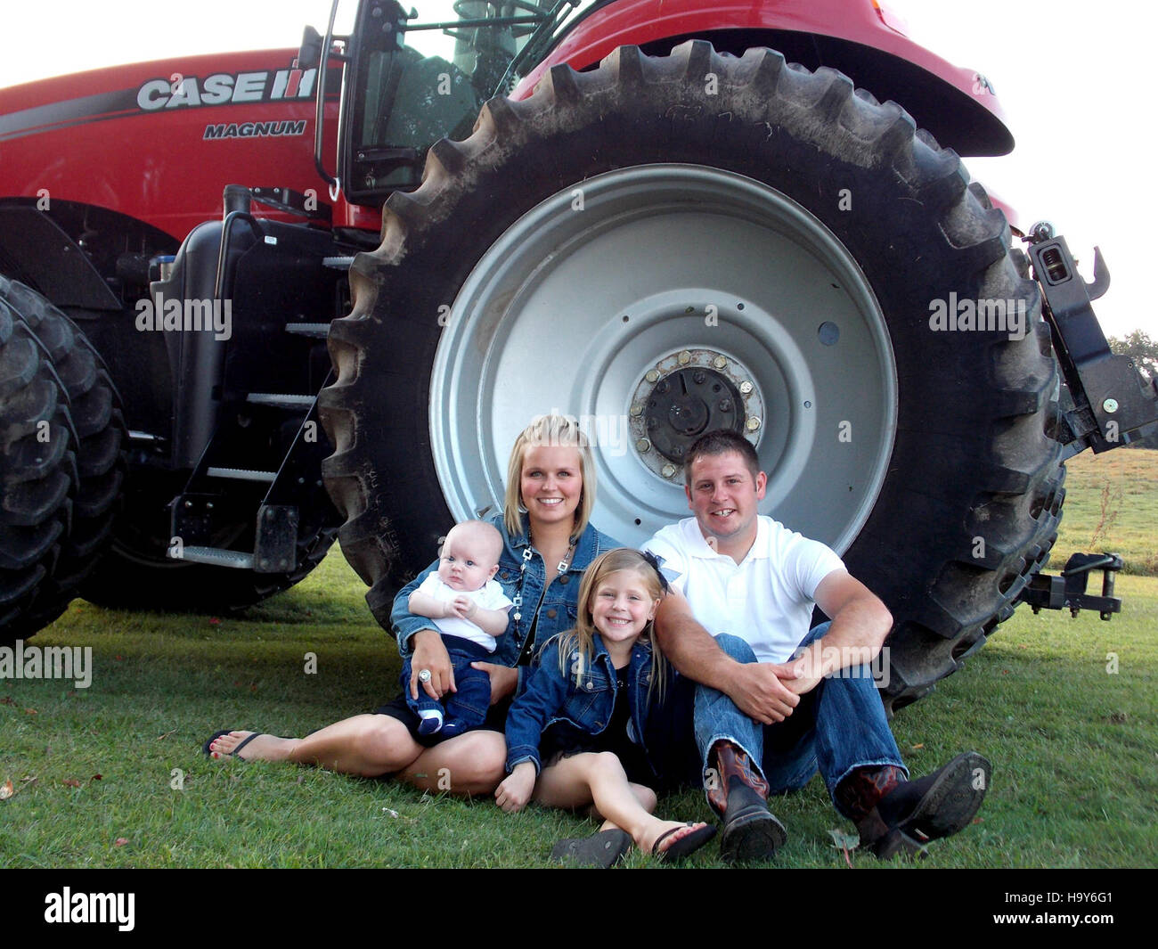 usdagov 15652975083 The Gaskin family in front of tractor Stock Photo ...