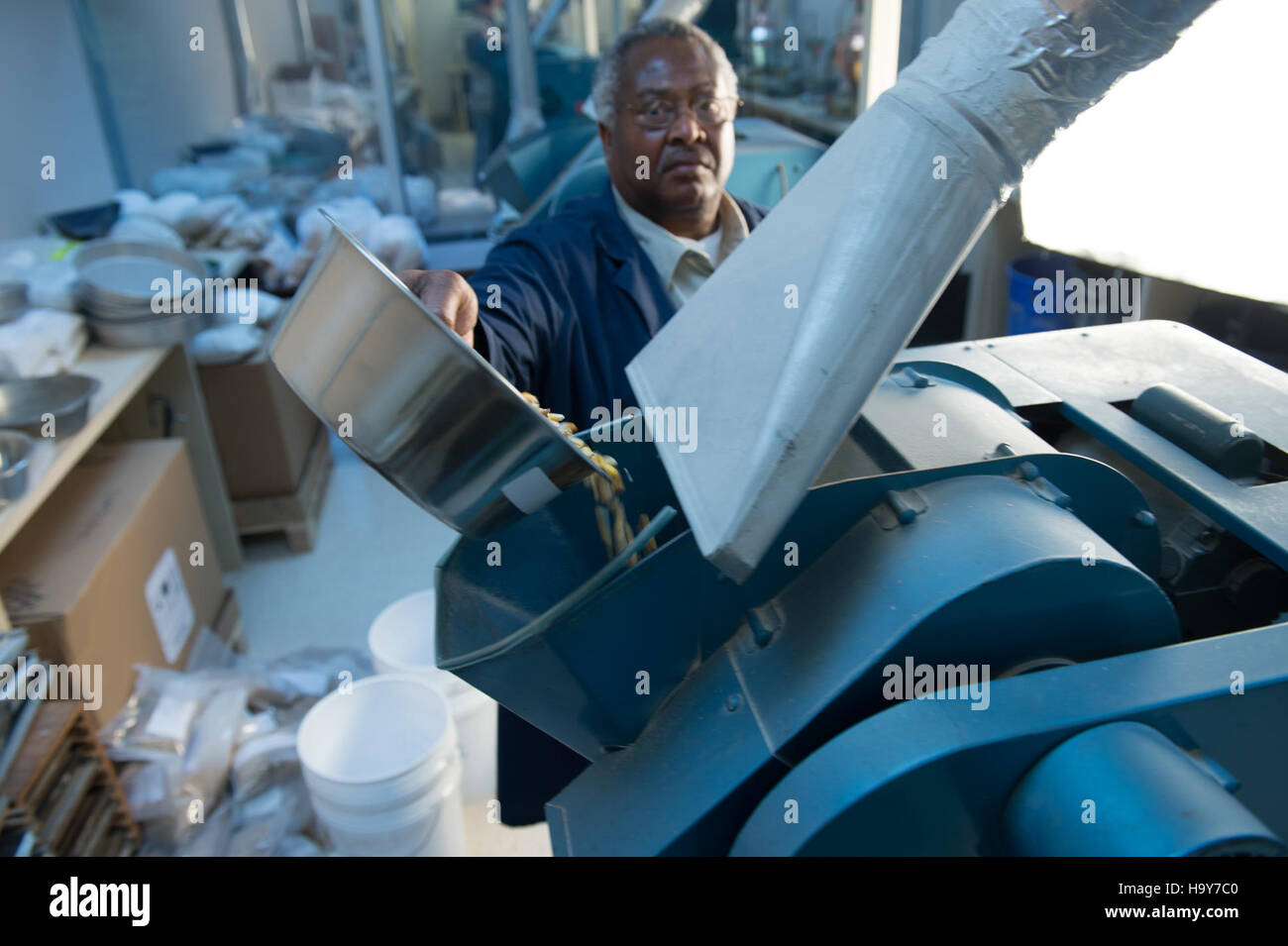 This image shows USDA and GIPSA inspectors working at a grain facility ...