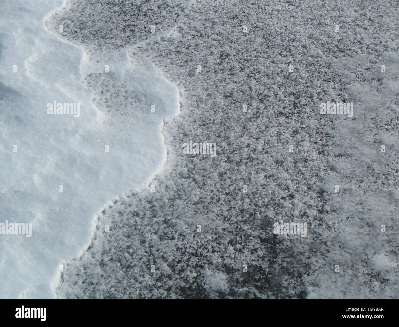 This close-up of snow and ice textures highlights the intricate ...
