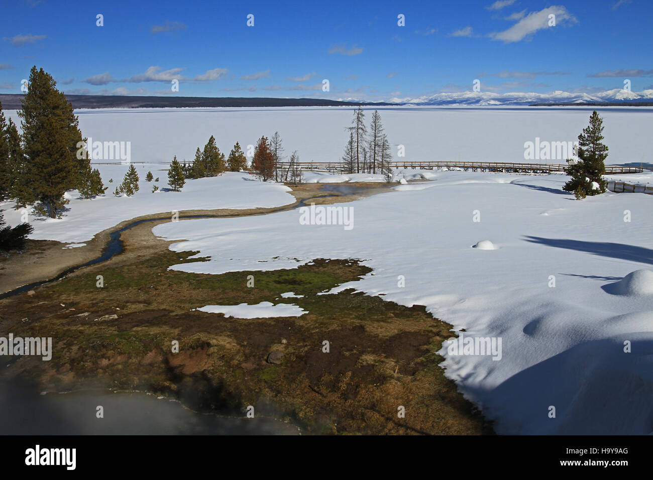 This image captures a view of Yellowstone Lake from the Bluebell Pool ...