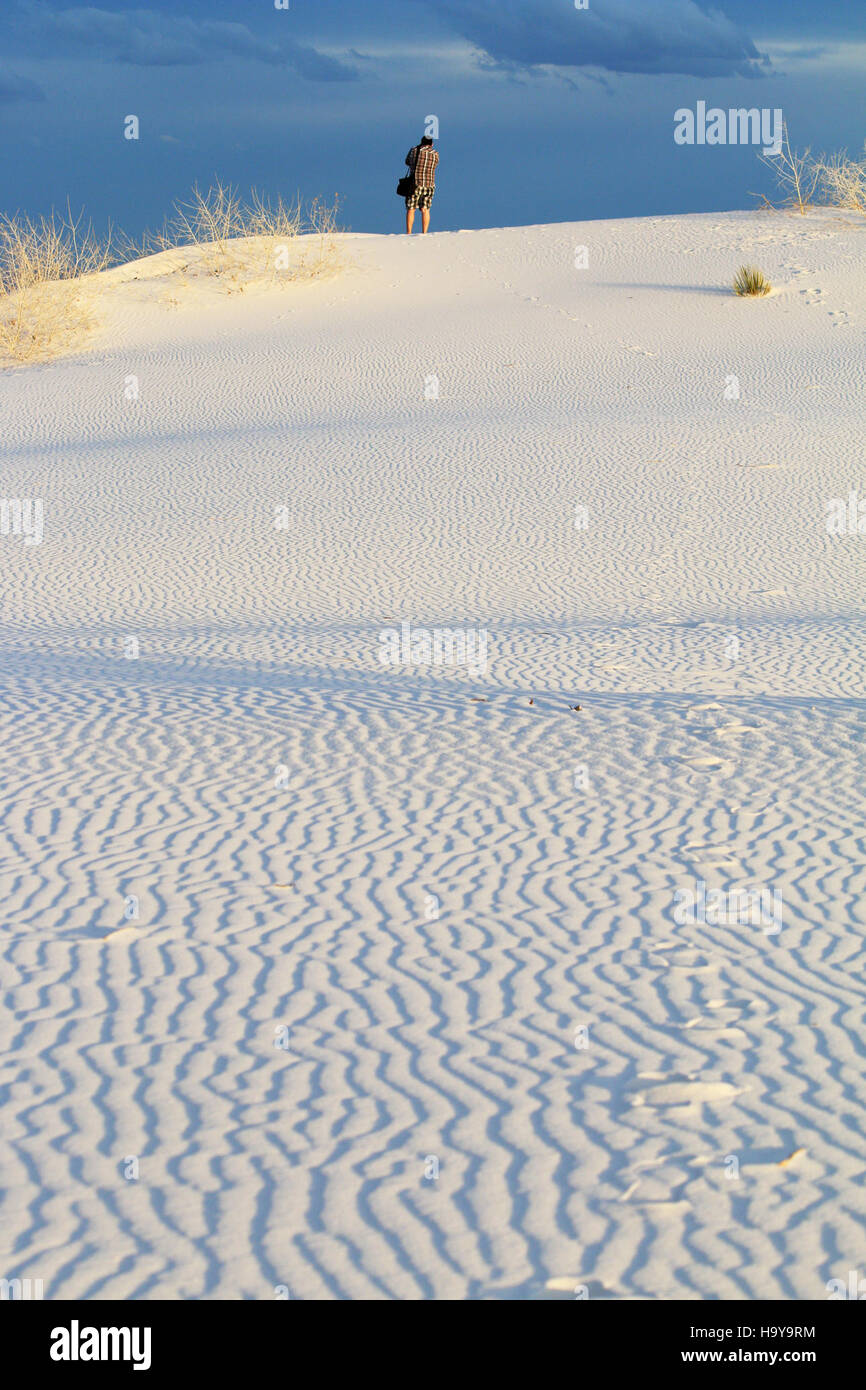 A close-up image of footprints in the sand, illustrating the ...