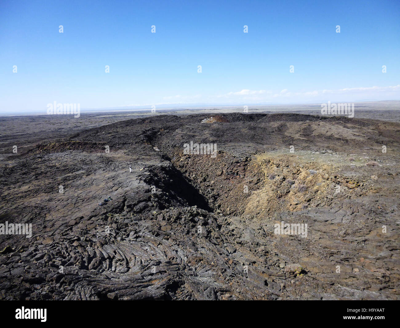 This photograph captures Pillar Butte Vent, a geological feature within ...