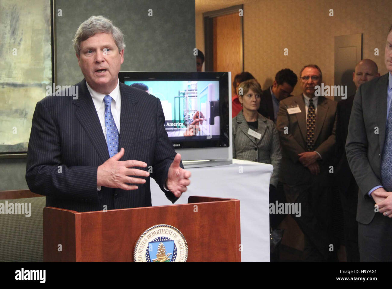 The image features Tom Vilsack, U.S. Secretary of Agriculture, during a ...