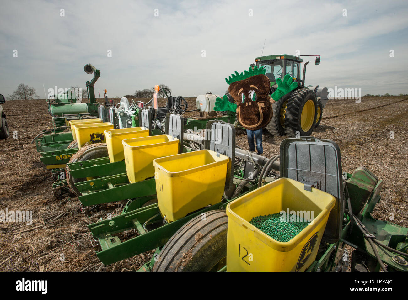 A photograph showing the NRCS mascot, Sammy Soil Stabler, in a field at ...