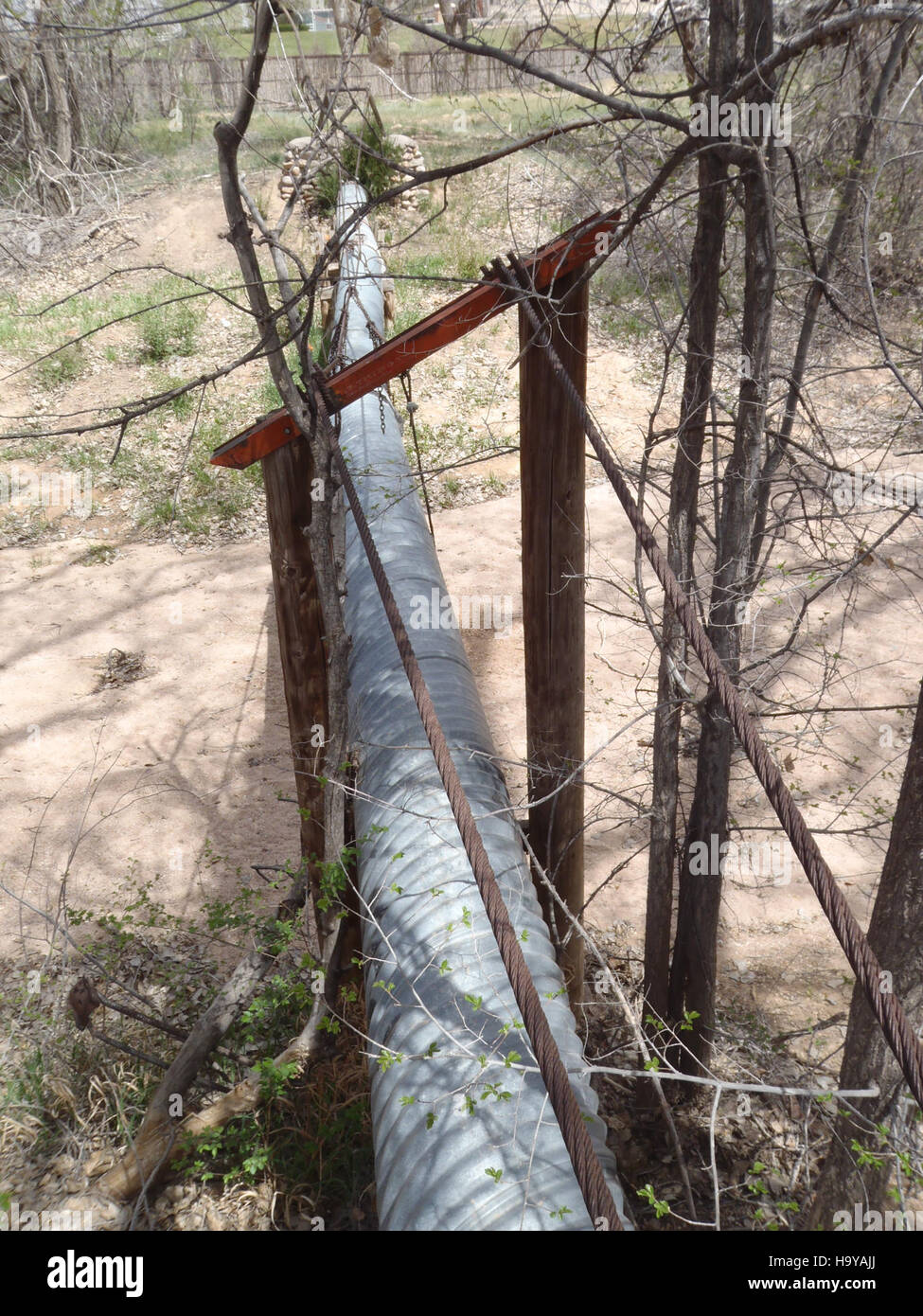 This image, sourced from the USDA, shows a sluice structure with a ...