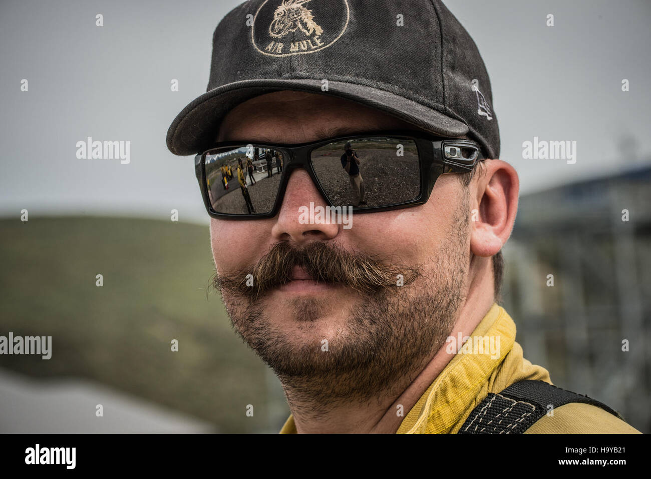 This image shows wildland firefighter rope rappel training conducted by ...