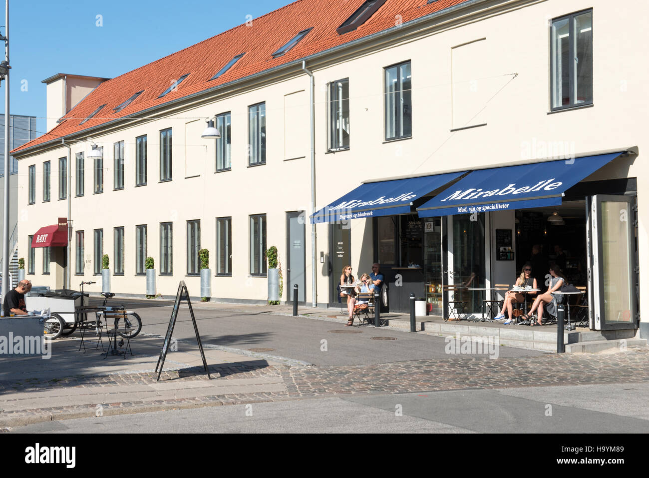 Mirabelle restaurant in Copenhagen on a sunny day with people sitting ...