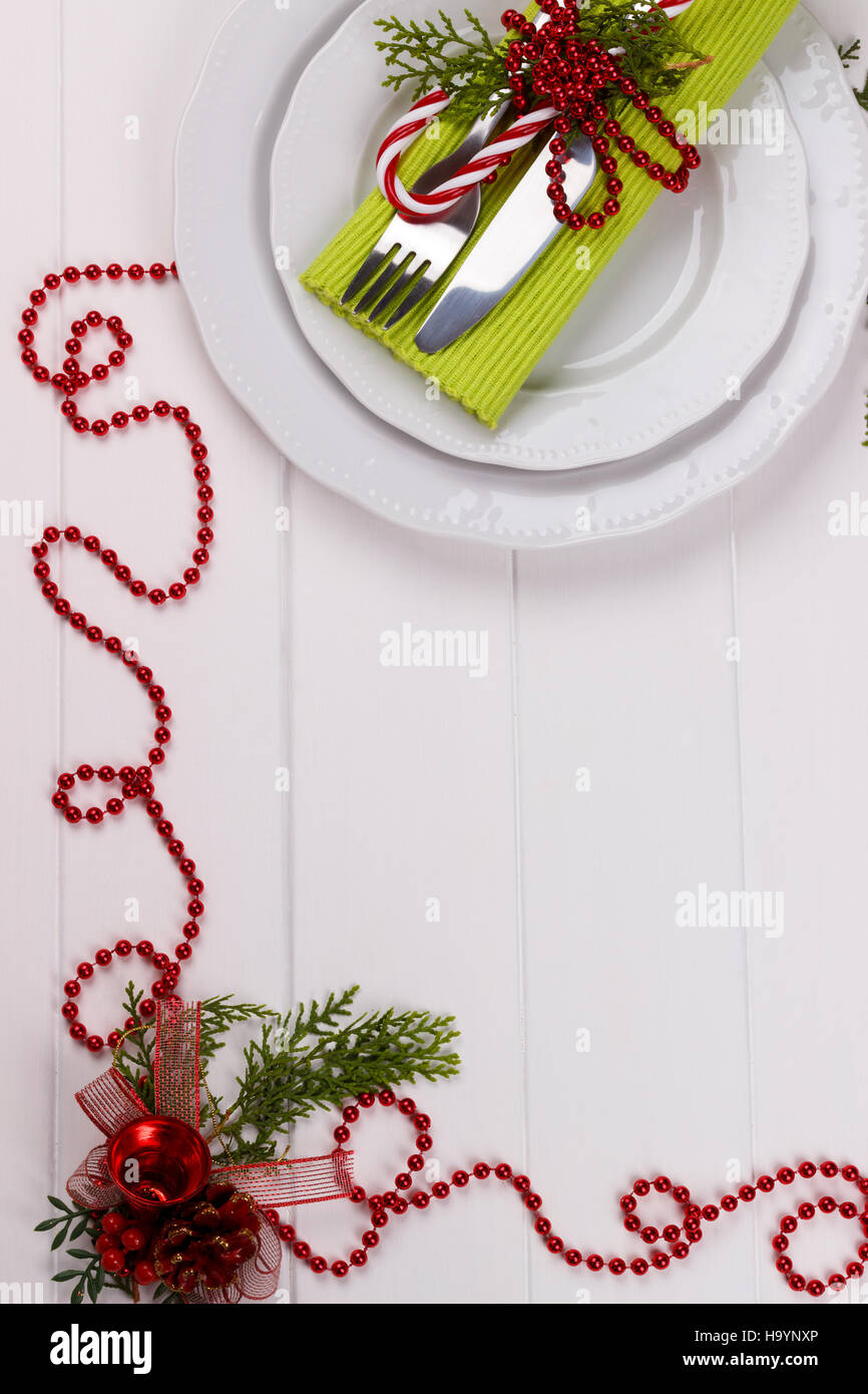 Christmas table setting on white wooden table.Christmas card template ...
