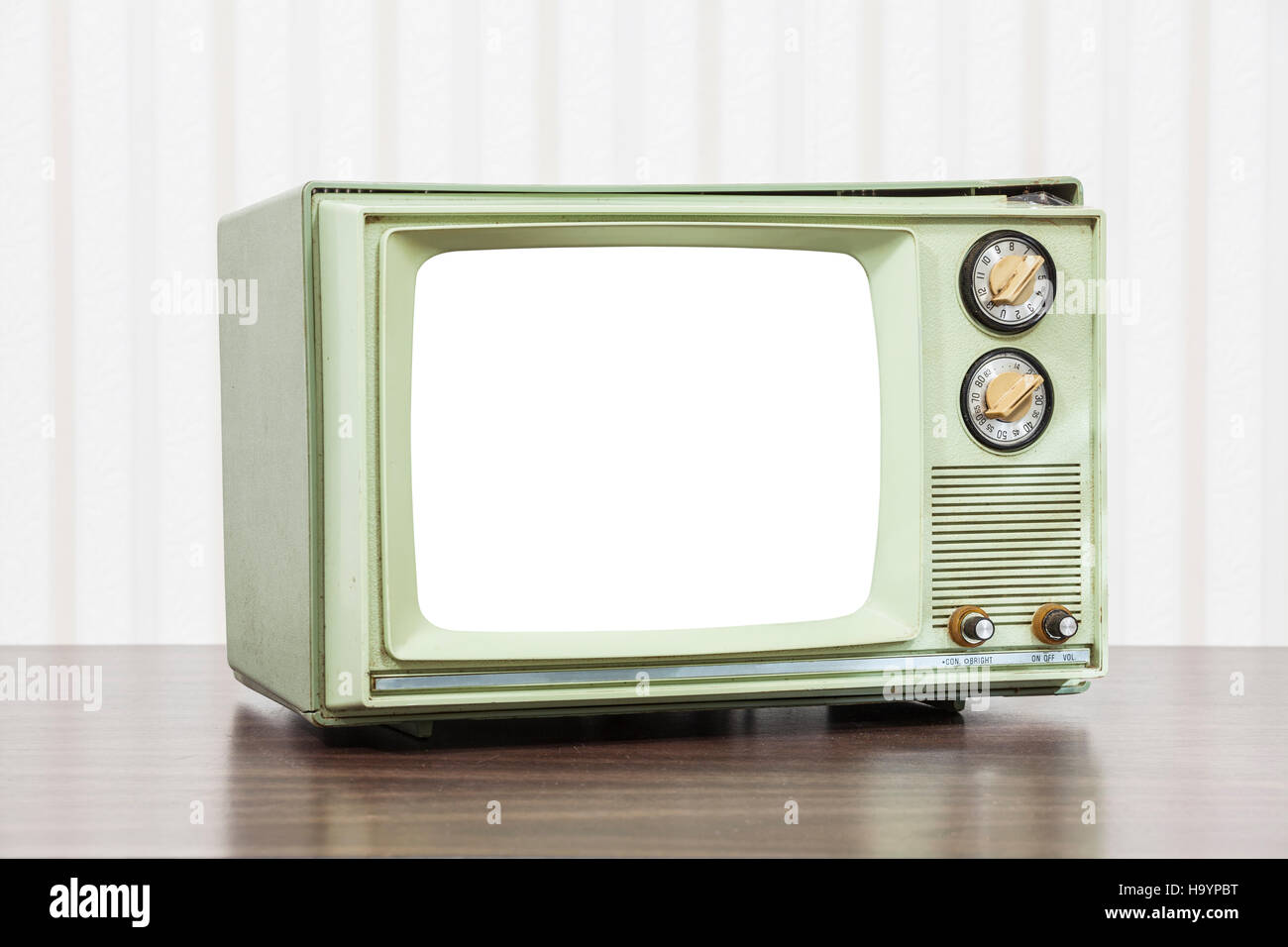 Old green television with cut out screen Stock Photo - Alamy
