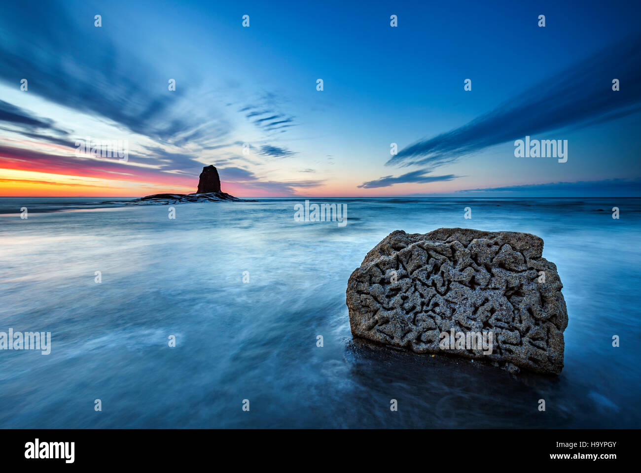 Rock formation at Saltwick Bay with Black Nab in background. North ...