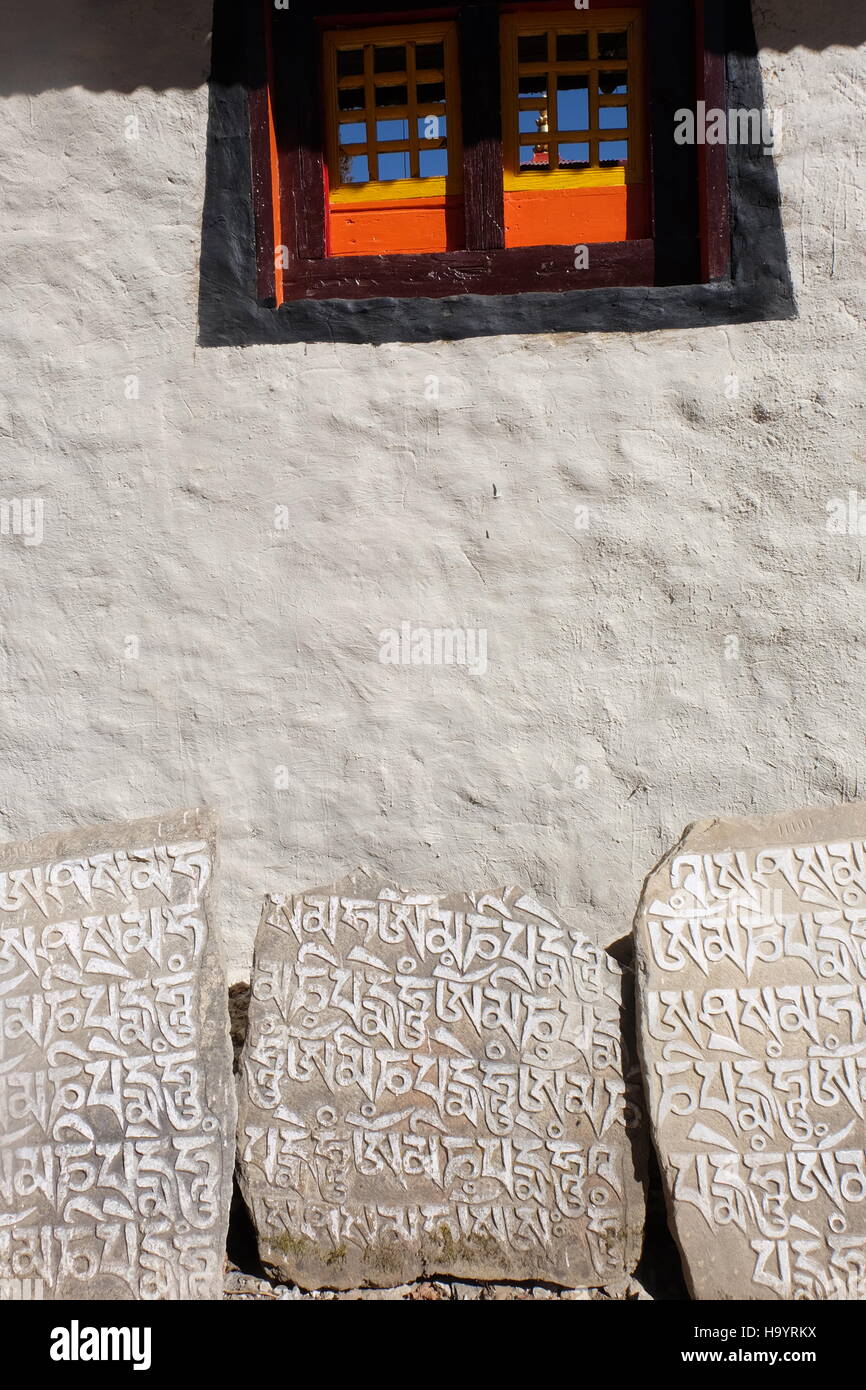 window with prayer tablets in Nepal Stock Photo - Alamy