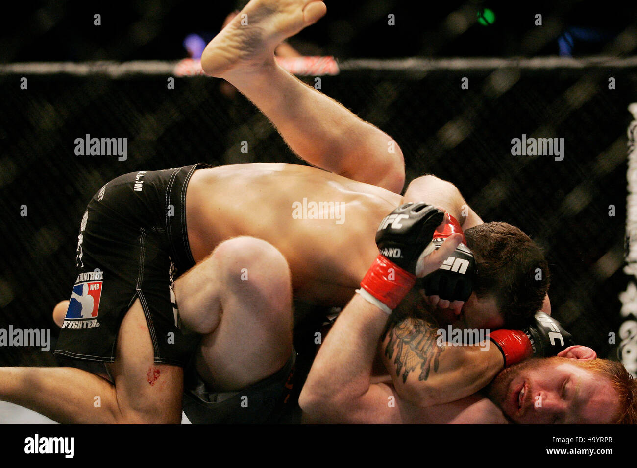 Frank Edgar, left, fights Mark Bocek at UFC 73 at the Arco Arena in ...