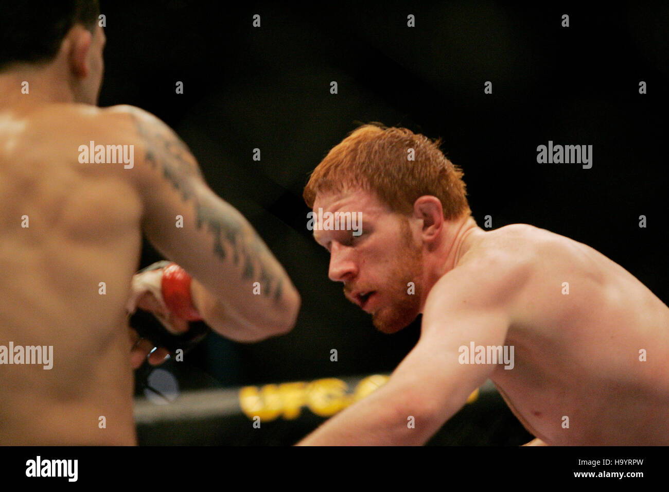 Frank Edgar, left, fights Mark Bocek at UFC 73 at the Arco Arena in ...