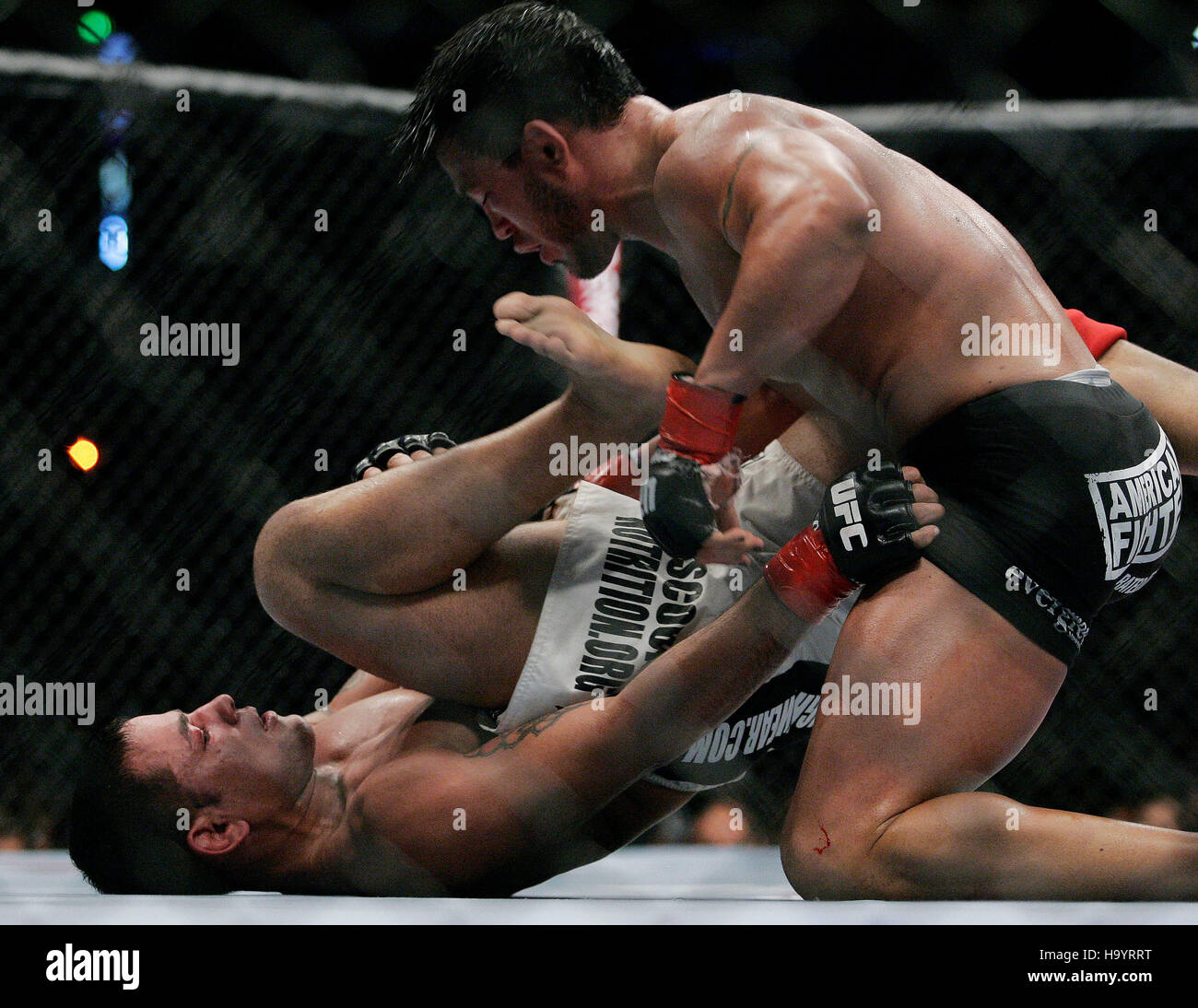 Diego Saraiva, bottom, fights Jorge Gurgel during UFC 73 at the Arco ...
