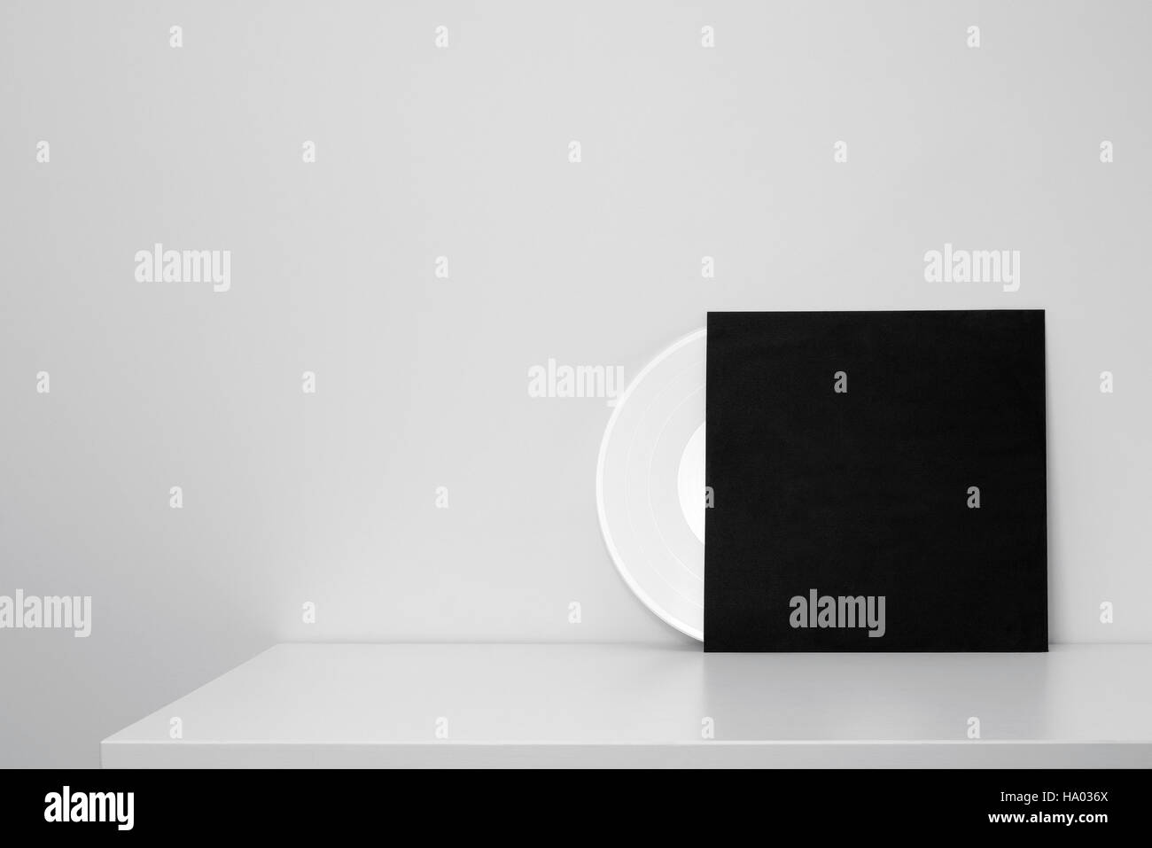 white vinyl record in black paper case Stock Photo - Alamy