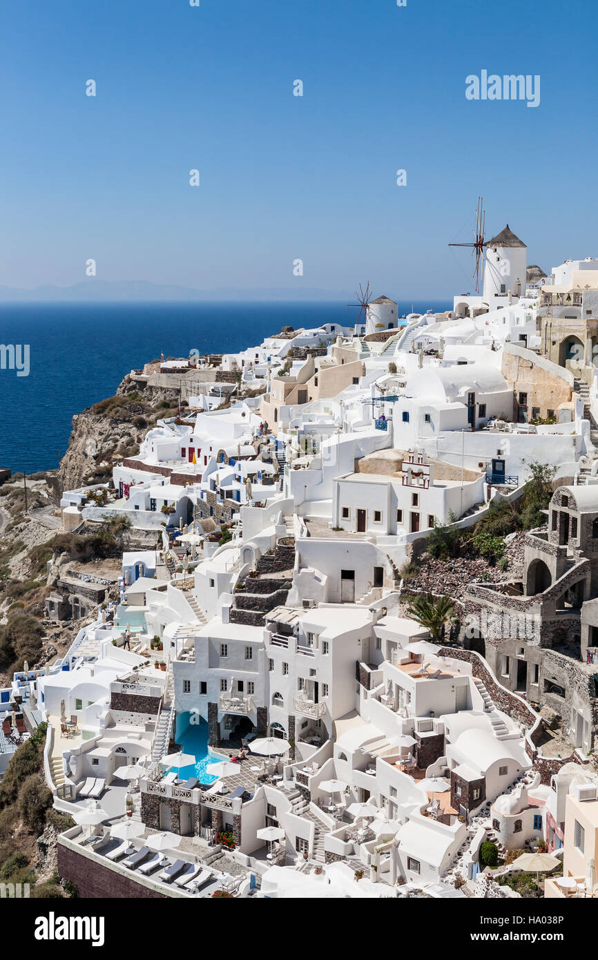 Village of Oia, Santorini, Greece on the cliffside of the volcano ...