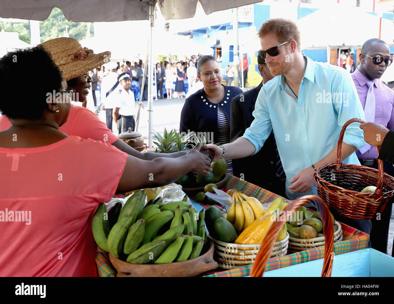 Prince Harry visits a market during a St Lucian street festival in ...