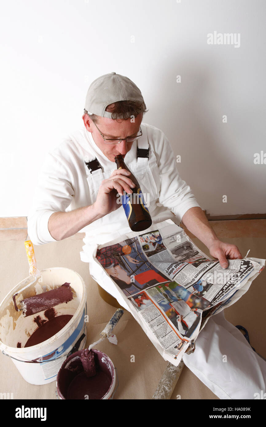 Painter taking a break Stock Photo - Alamy