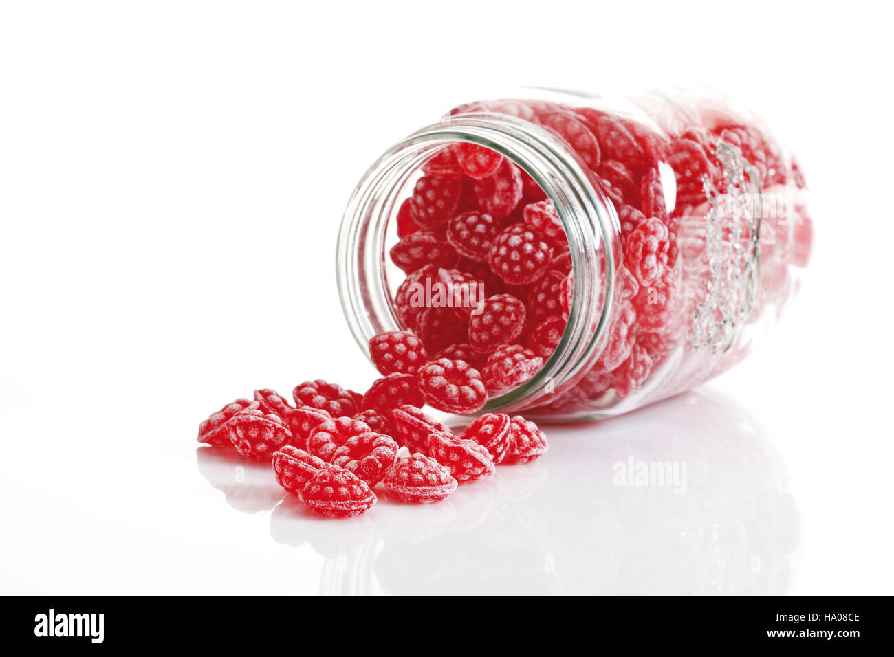 Raspberry sweets in a sweets jar Stock Photo - Alamy