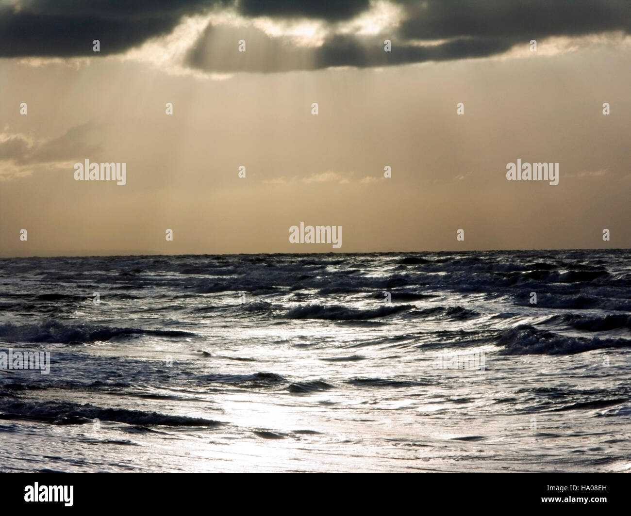Gleaming ray of light on the sea Stock Photo - Alamy