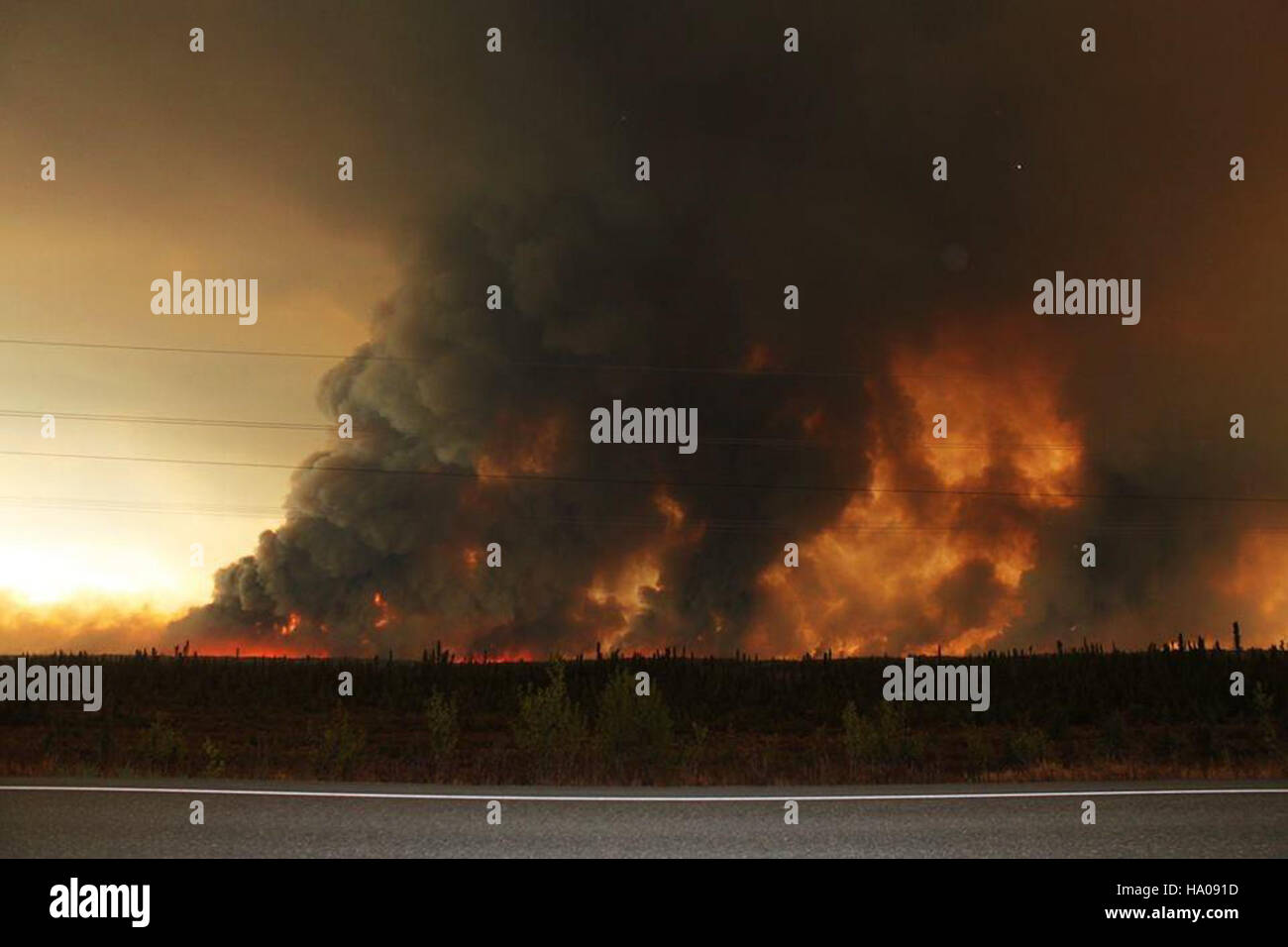 This image highlights the vital work of firefighters battling wildfires ...
