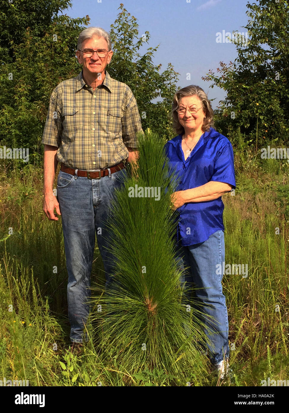 Tim and Harriette Allen participate in an environmental event, engaging ...