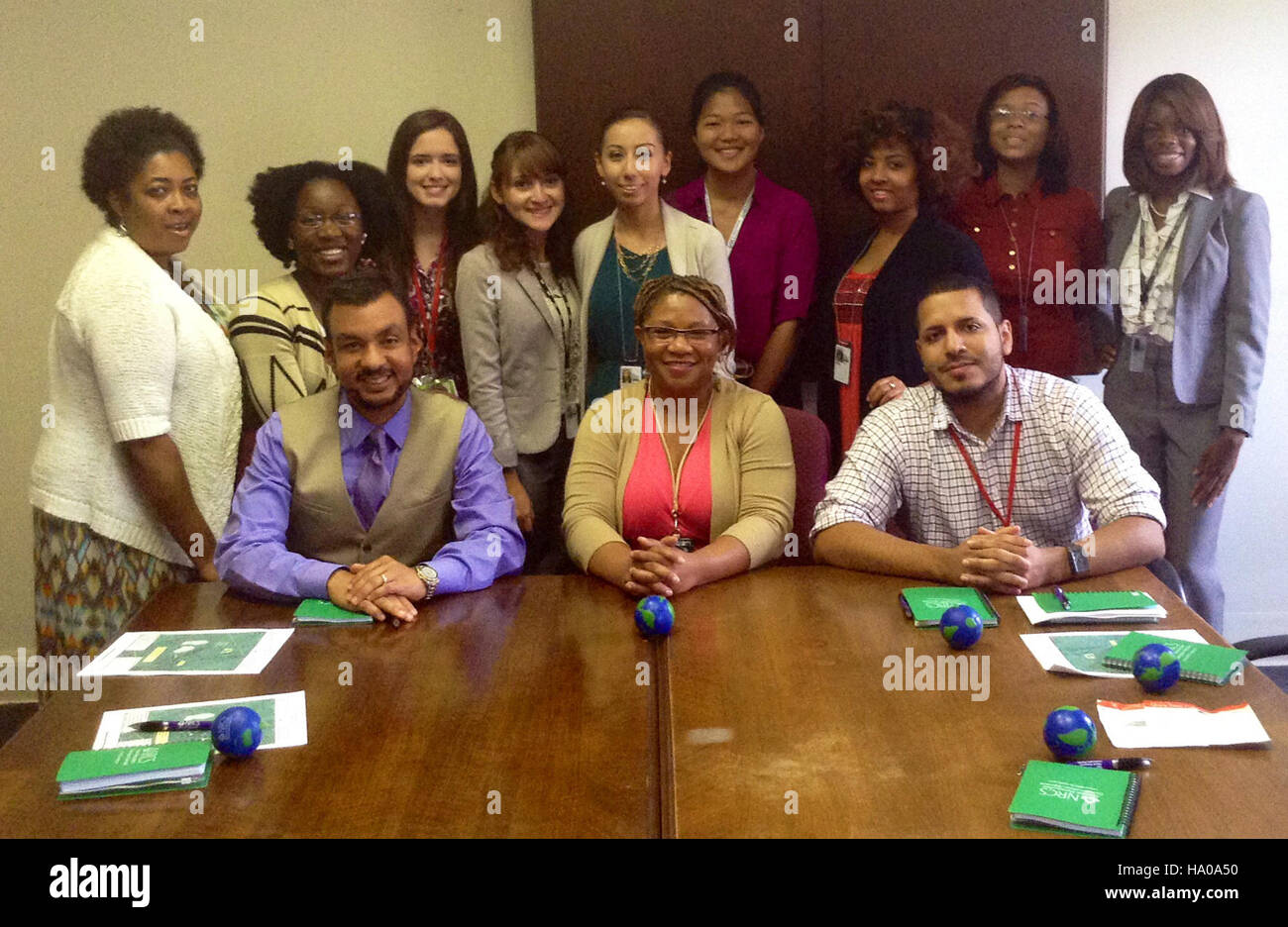 A photo showing USDA interns involved in environmental science programs ...