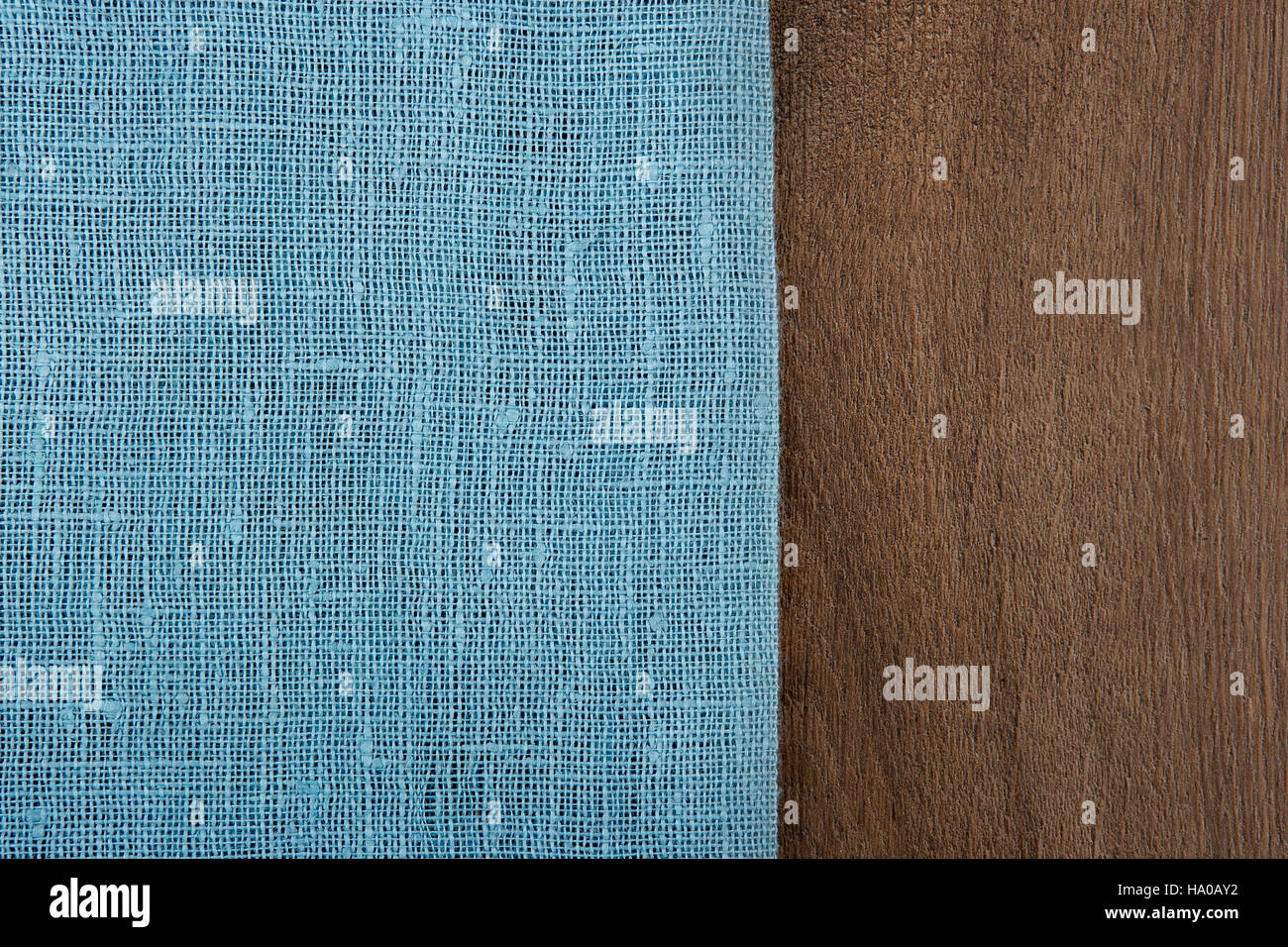 Sackcloth from left side wooden table. Soft blue woven linen fabric ...