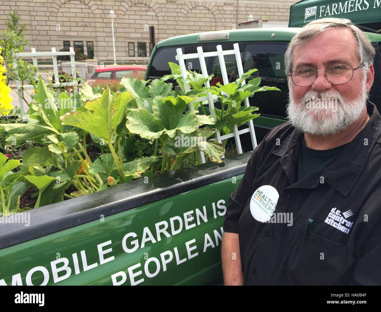 This image captures a 2014 Farmers Market celebration, showcasing fresh ...
