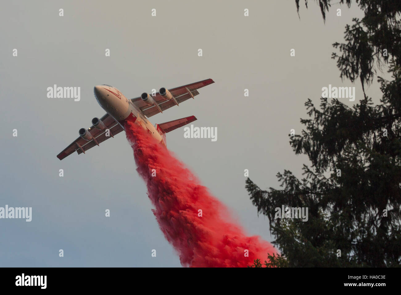 Firefighters utilize air tankers and fire retardant in response to the ...