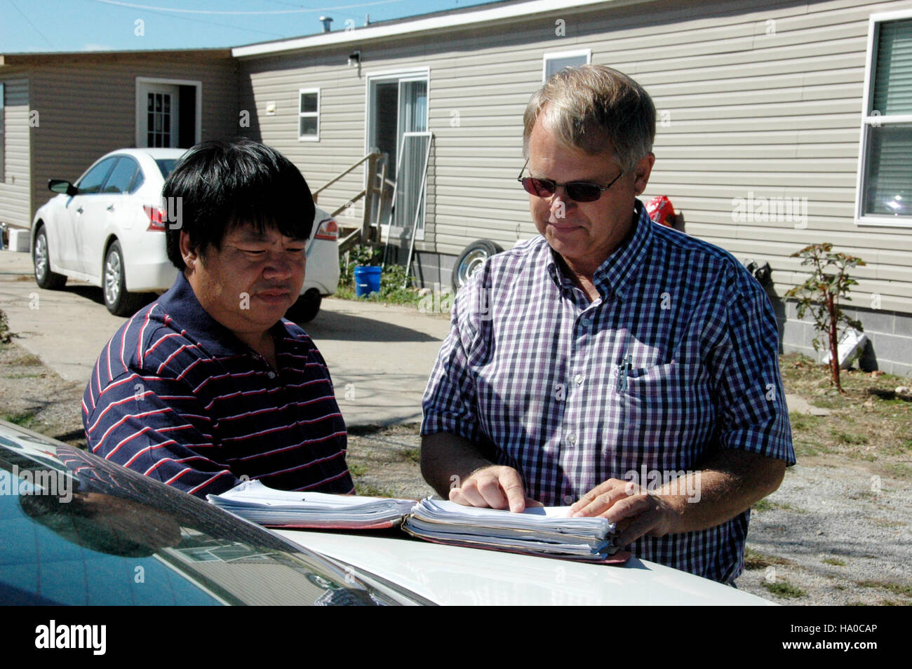 This image features Kao Her and Lynn Jenkins in a discussion related to ...