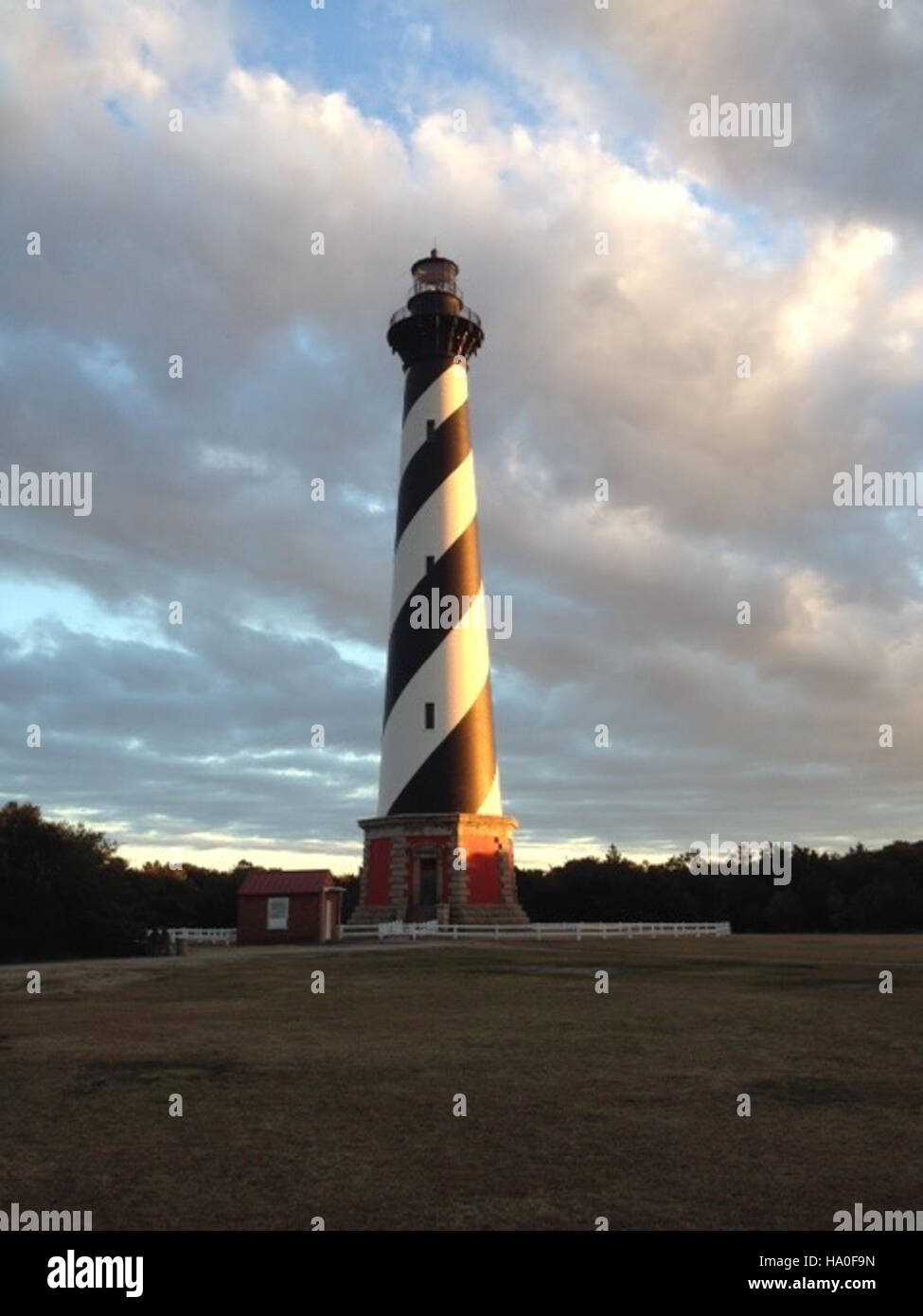 The Cape Hatteras Lighthouse, situated in a national park, stands as an ...