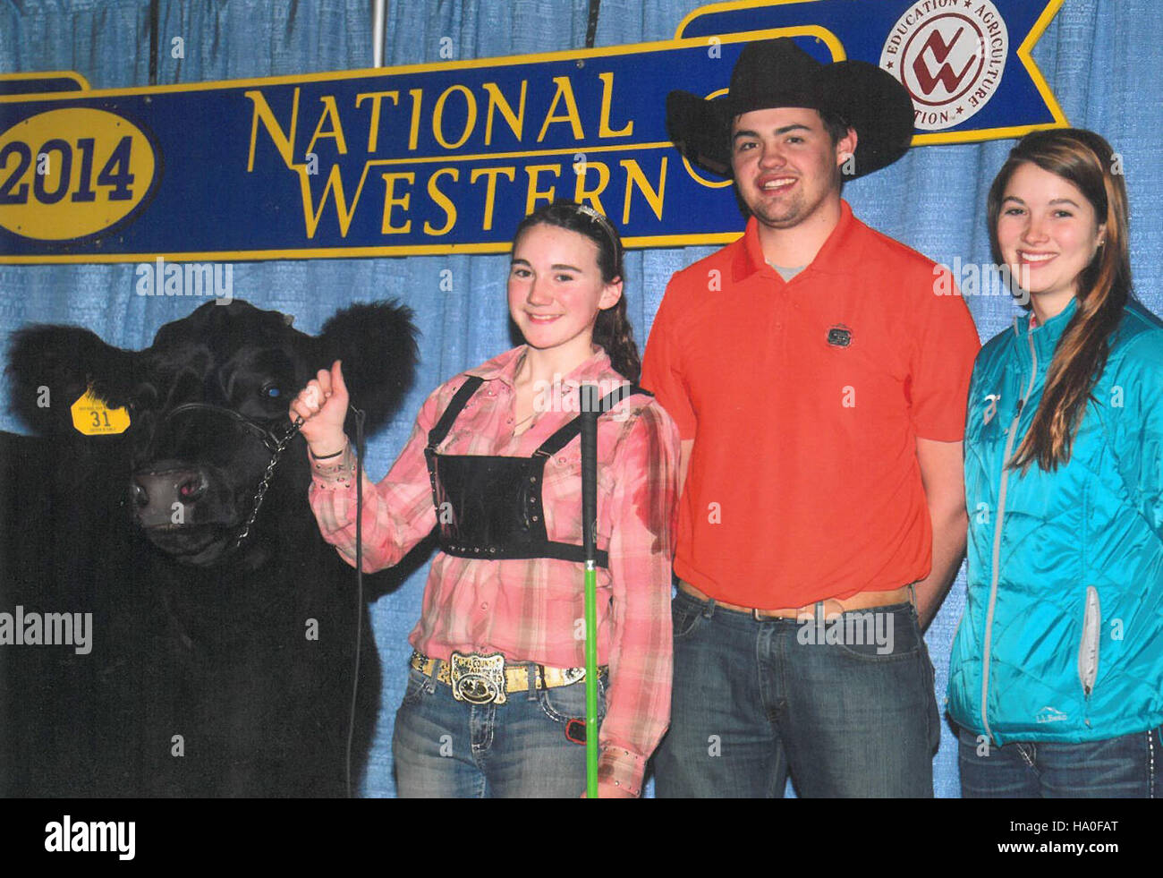 Lakota Roberson (left) with representatives from Flying Diamond Ranch ...