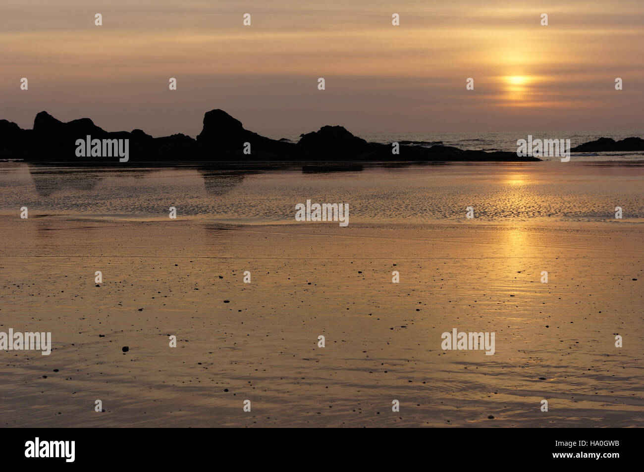 Sunset at Ruby Beach on the Washington coast offers stunning views of ...
