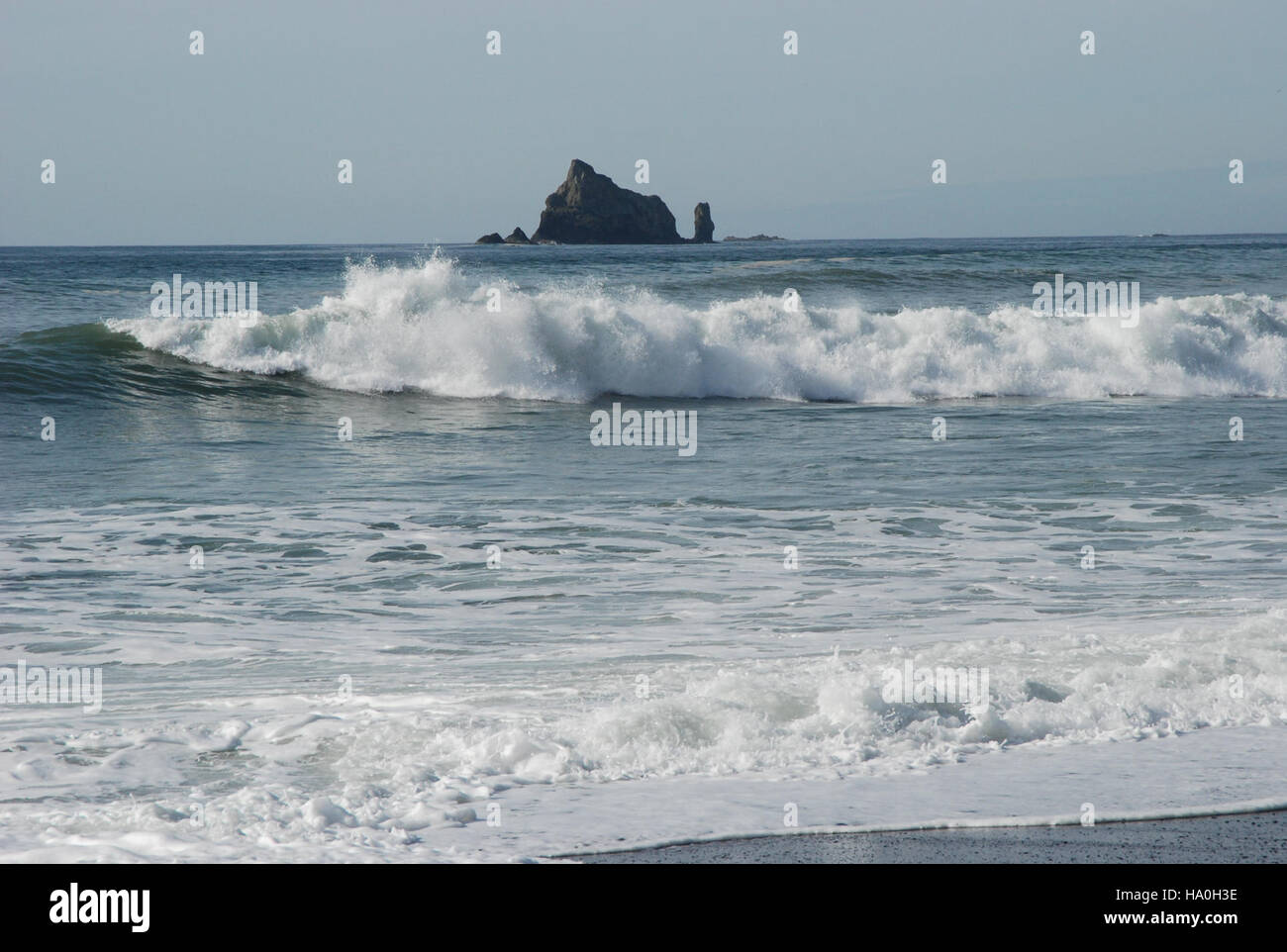 The waves breaking on the sea stacks at Rialto Beach in Olympic ...