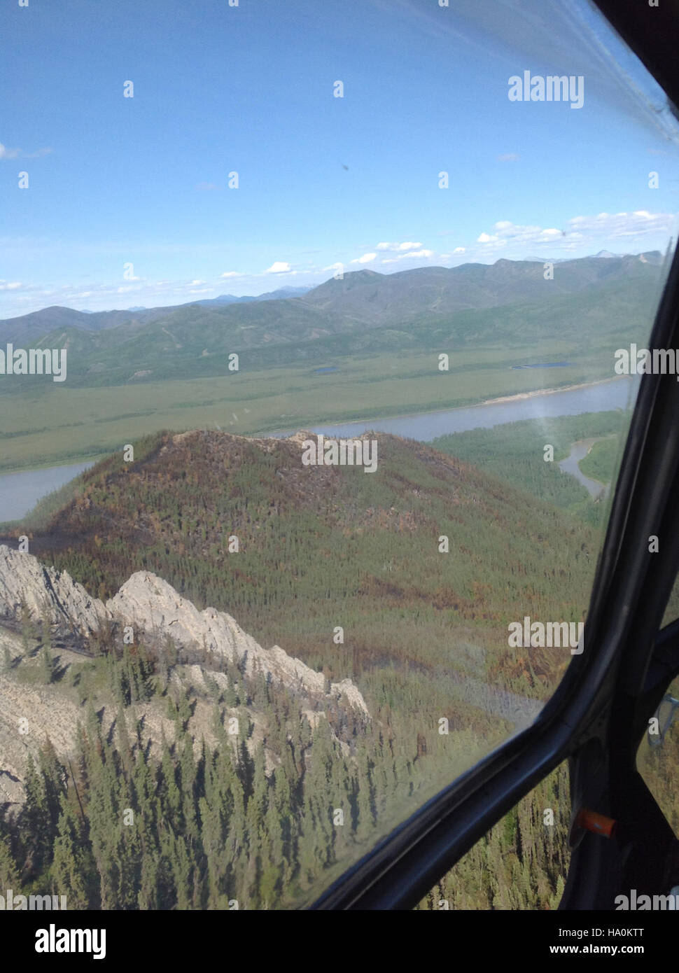A photograph captured from a helicopter in Alaska shows the vast ...