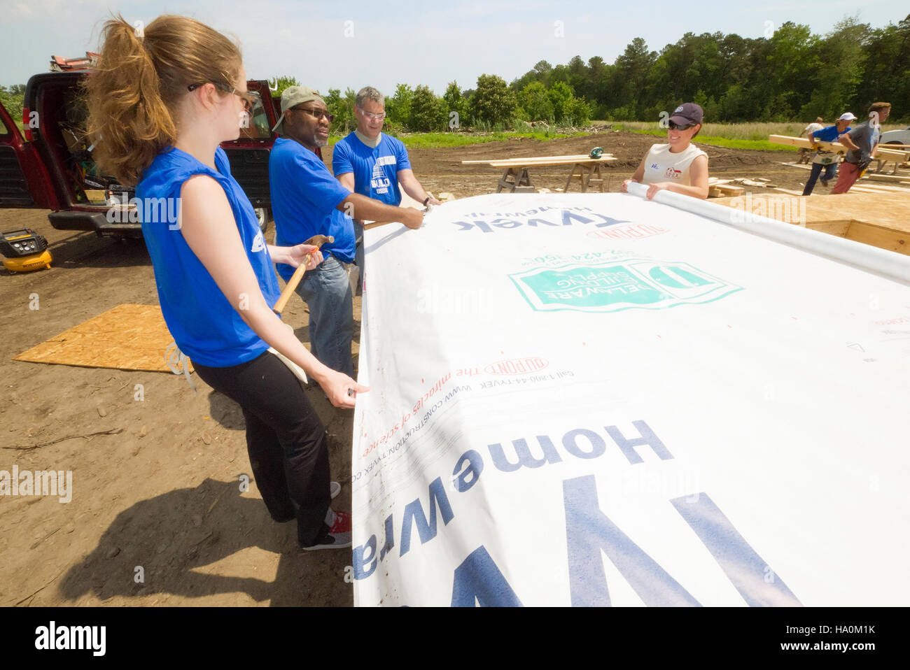 This image shows the construction of self-help housing funded by the U ...