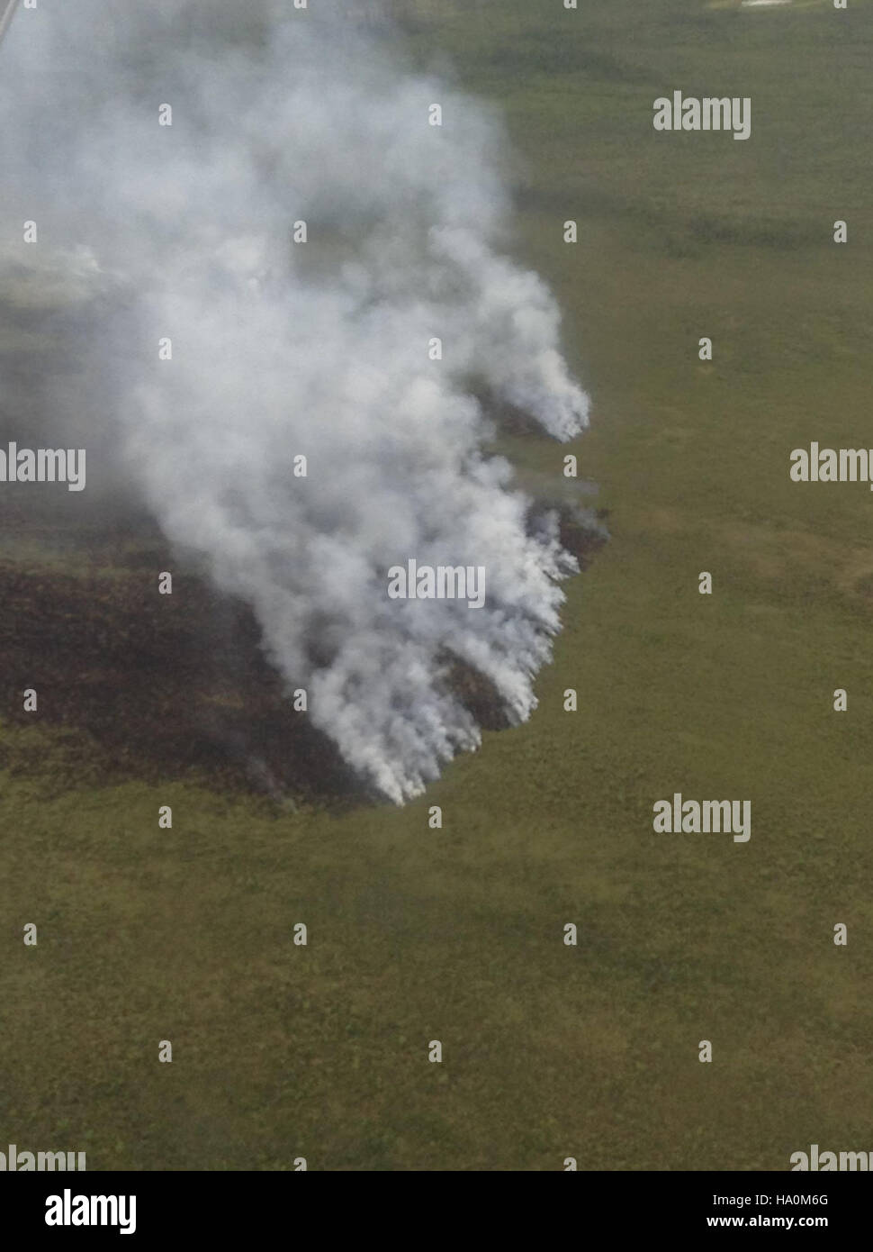 An aerial photo of the Chisana River area taken during a fire in June ...