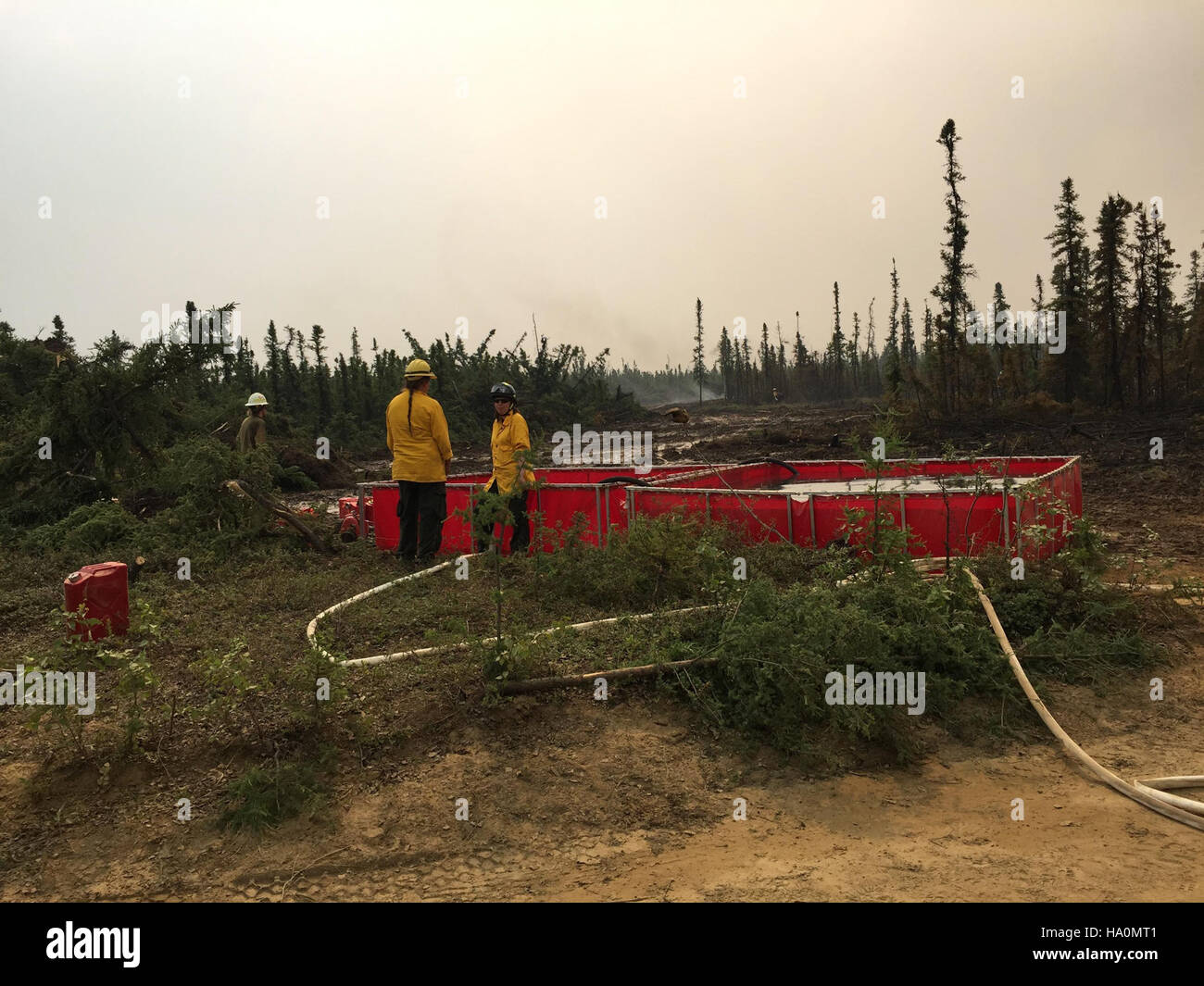 This image depicts a fire water tank used during a wildfire in Alaska ...
