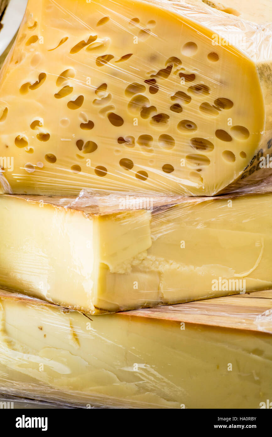 Front View of Big Pieces of Cheese for Sale Stock Photo - Alamy
