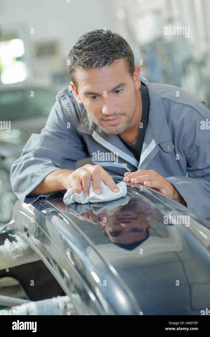 Male car mechanic wiping hi-res stock photography and images - Alamy