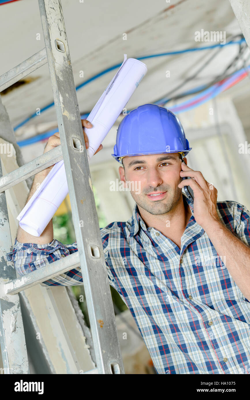 Worker on a building site Stock Photo - Alamy