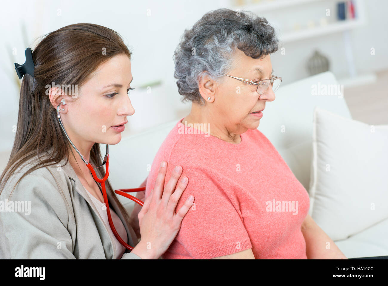 Senior woman having a check up Stock Photo - Alamy