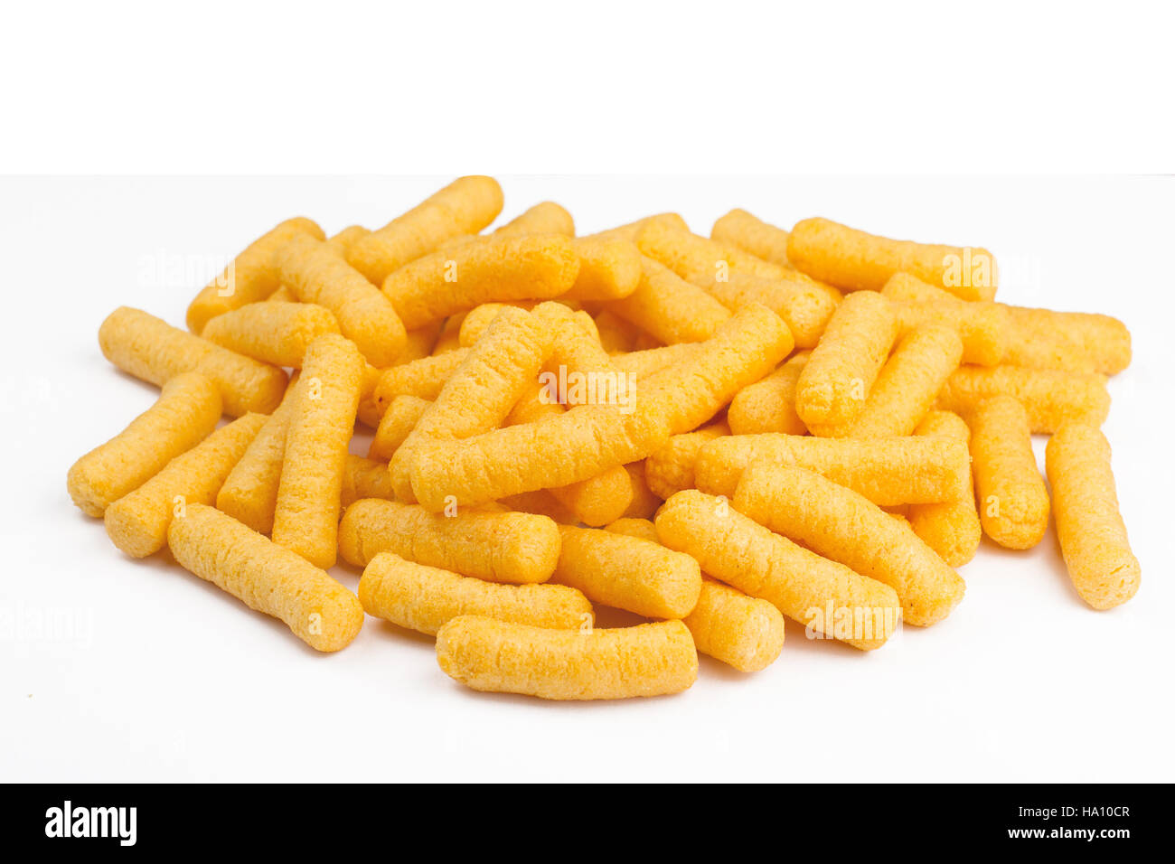 side view of many corn puff snacks isolated on white background Stock ...
