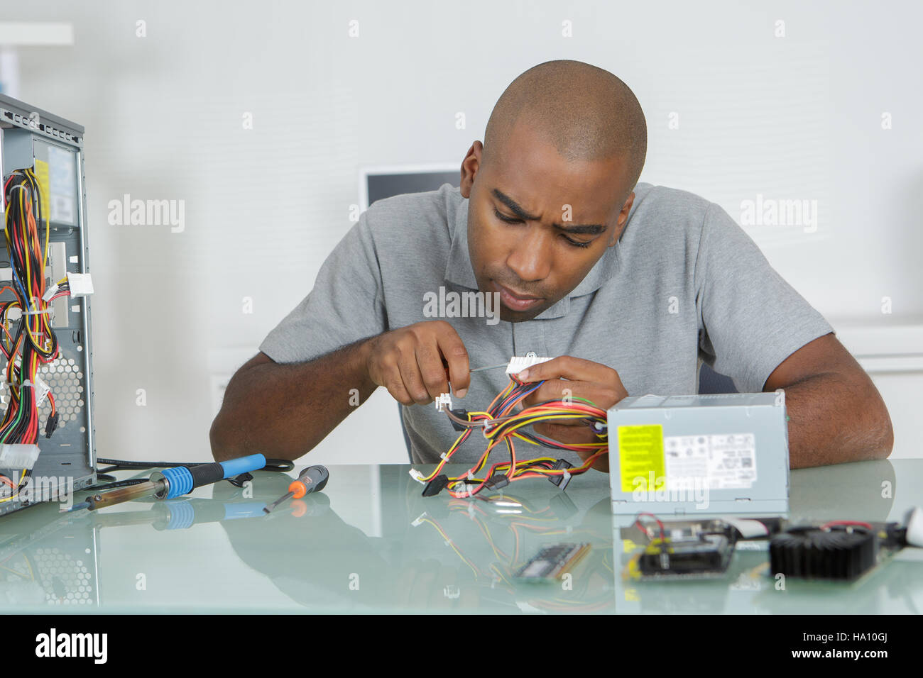 Man repairing computer Stock Photo - Alamy
